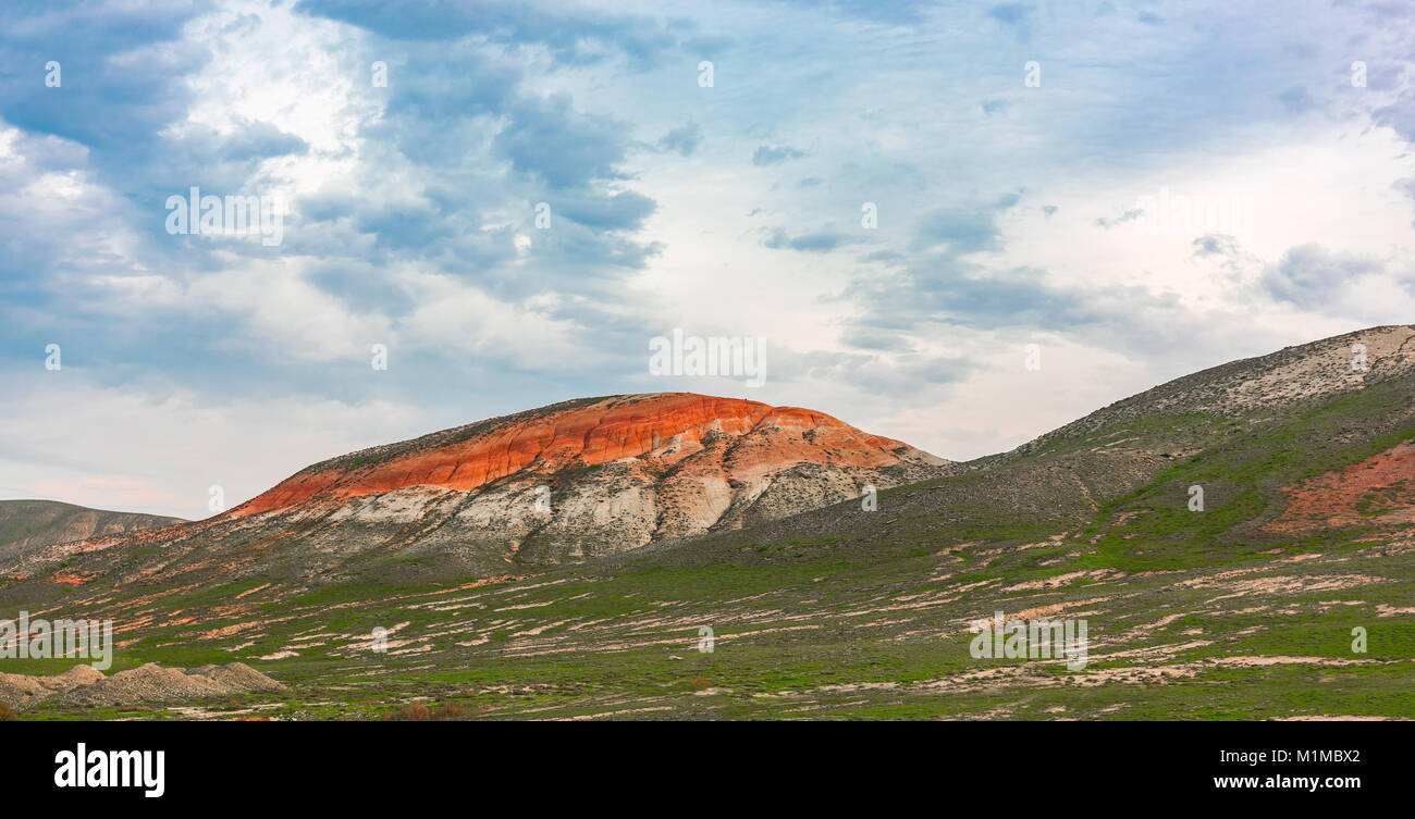 Amazing striped red mountains Stock Photo - Alamy
