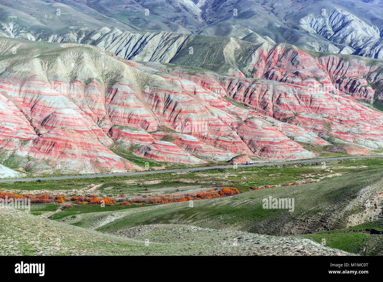 Amazing striped red mountains Stock Photo - Alamy