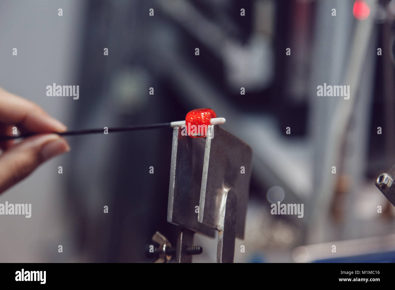 Process of manufacturing costume jewelery from Venetian glass Stock ...