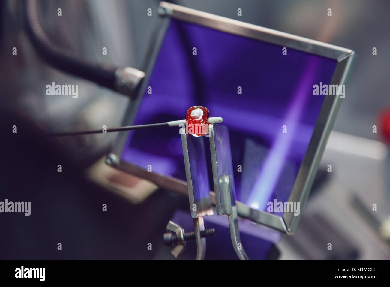 Process of manufacturing costume jewelery from Venetian glass Stock ...