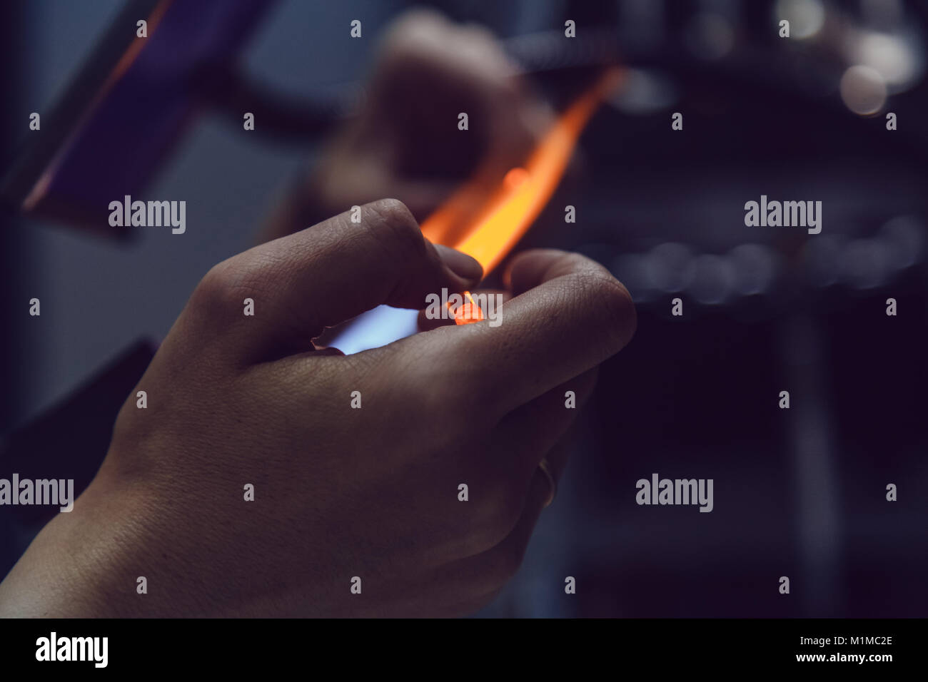 Process of manufacturing costume jewelery from Venetian glass Stock ...