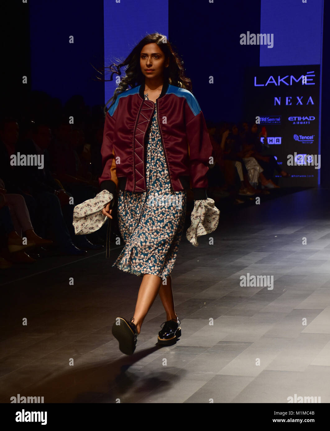 Mumbai, India. 31st Jan, 2018. A model walks on the runway during ...