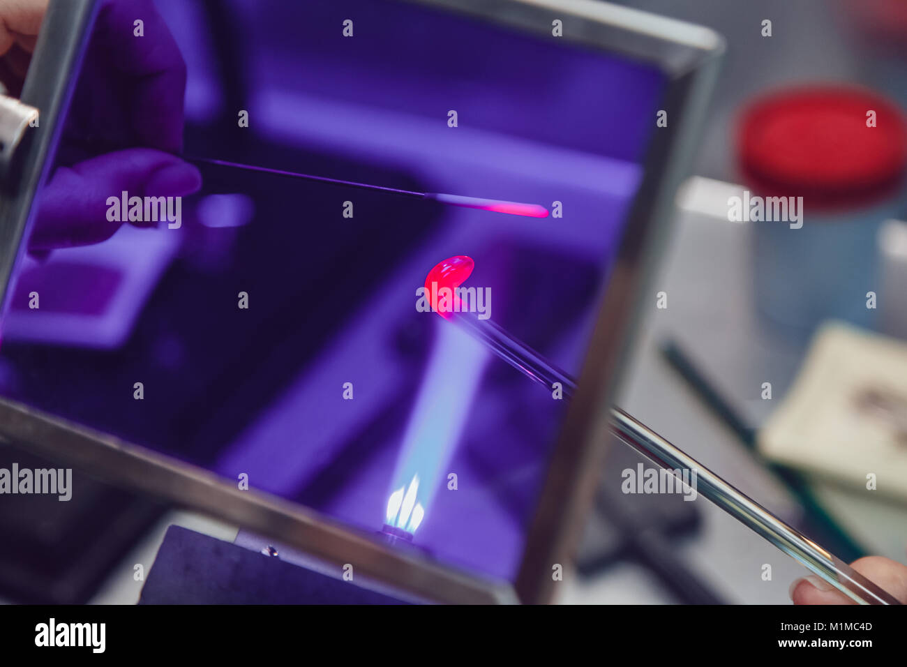 Process of manufacturing costume jewelery from Venetian glass Stock ...