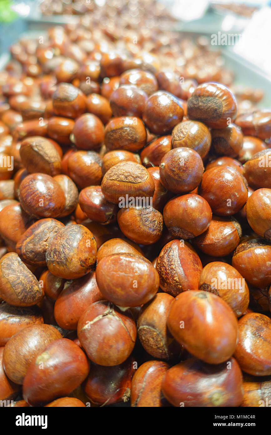 Close up roasting chestnuts background for sell Stock Photo - Alamy