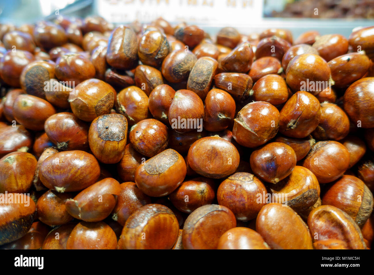Close up roasting chestnuts background for sell Stock Photo - Alamy