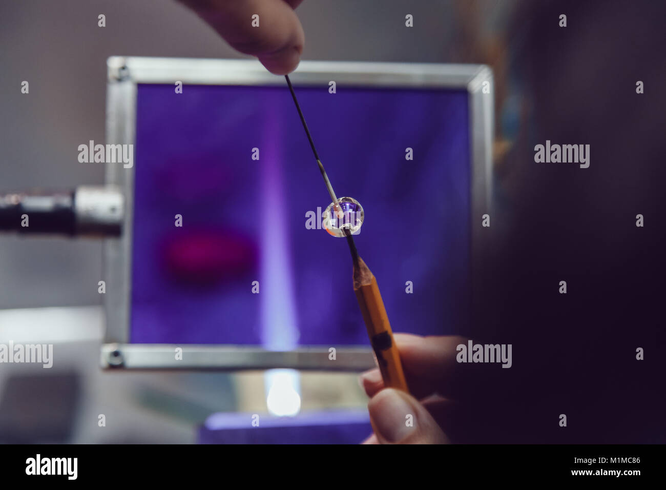 Process of manufacturing costume jewelery from Venetian glass Stock ...