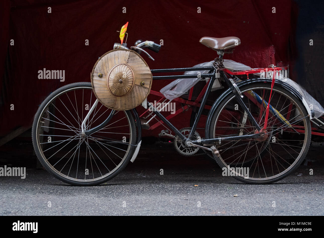 Bicycle with traditional bamboo hat in Yangoon, Myanmar Stock Photo - Alamy