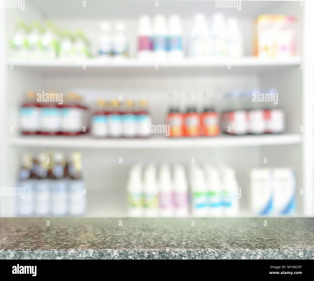 Wooden tabletop for products display with blurred of drugs store ...