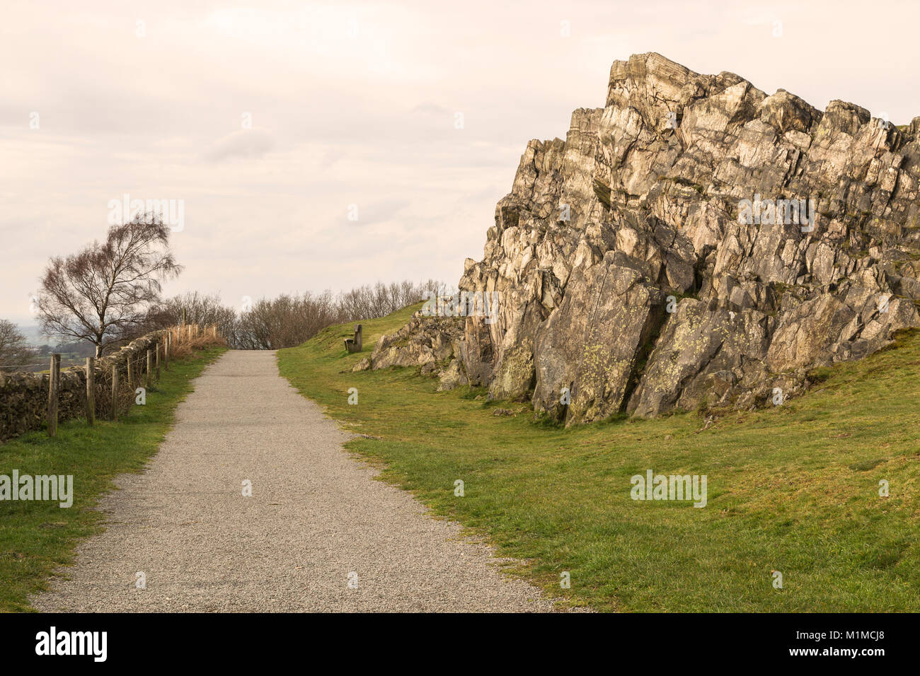 An image of an outcrop of rocks captured in late evening light shot at ...