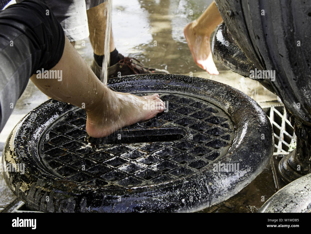 Girl washing feet hi-res stock photography and images - Alamy