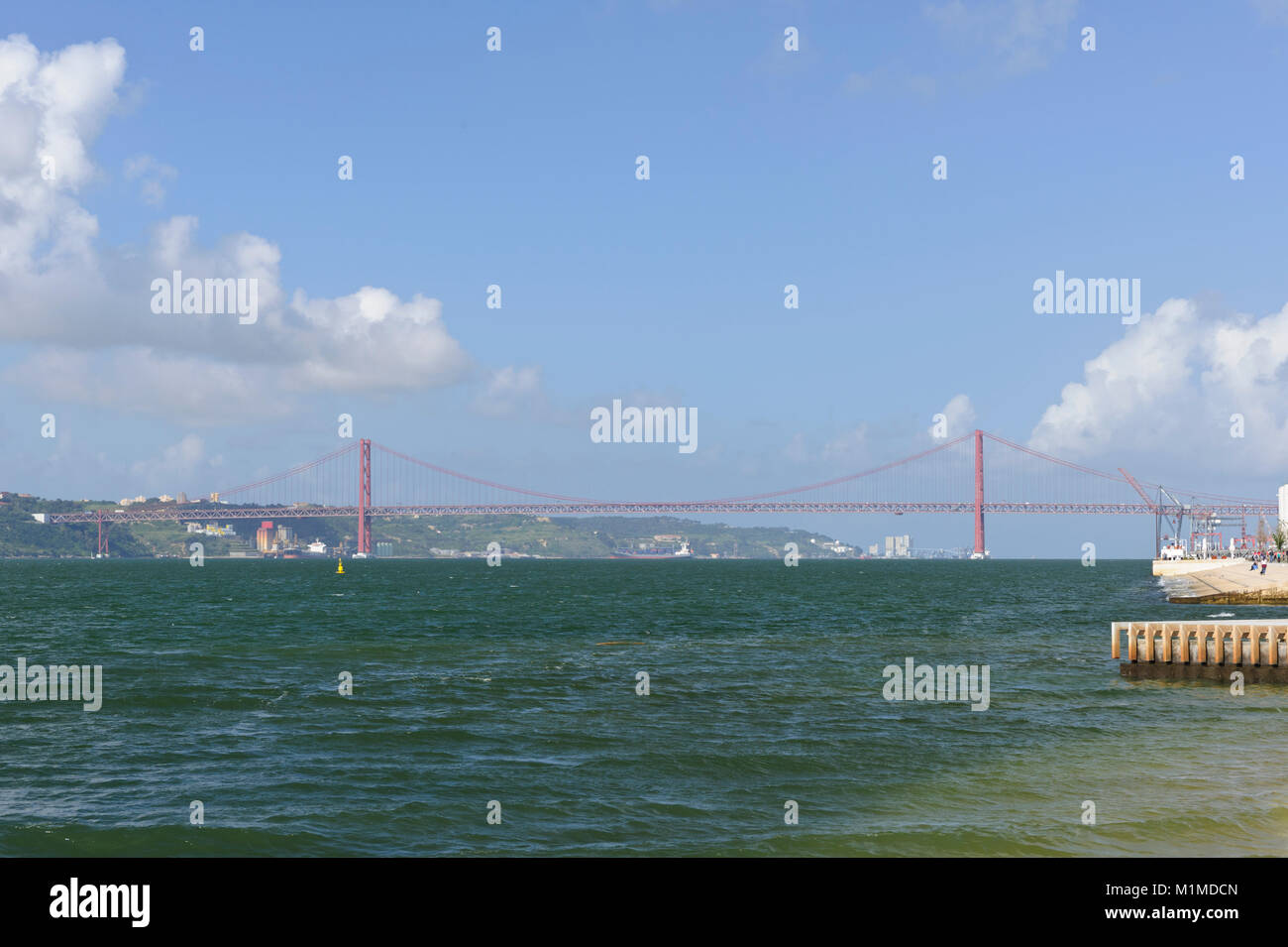 Ponte 25 de Abril suspension bridge in the distance crossing the river ...