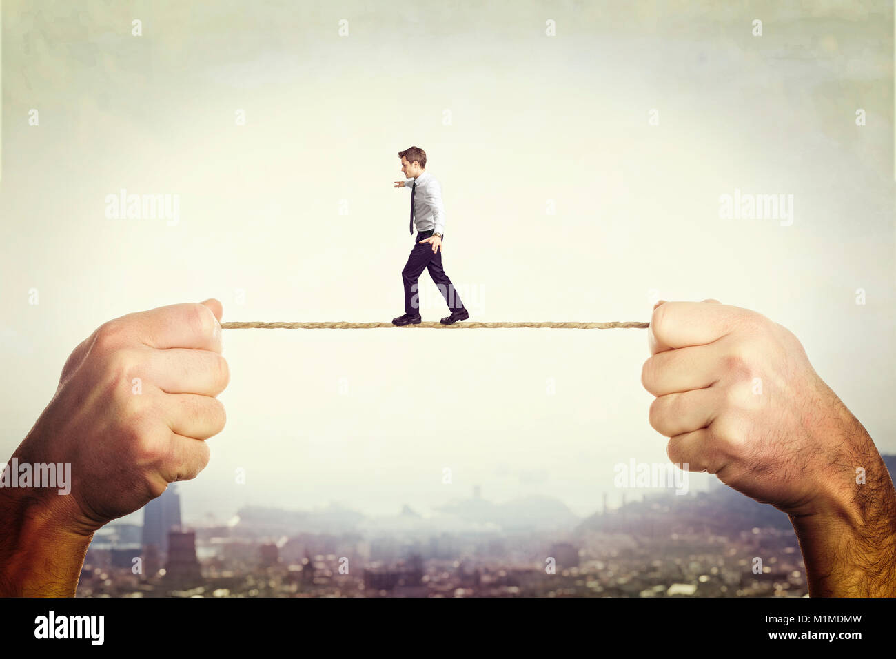 Man walking on rope hi-res stock photography and images - Alamy