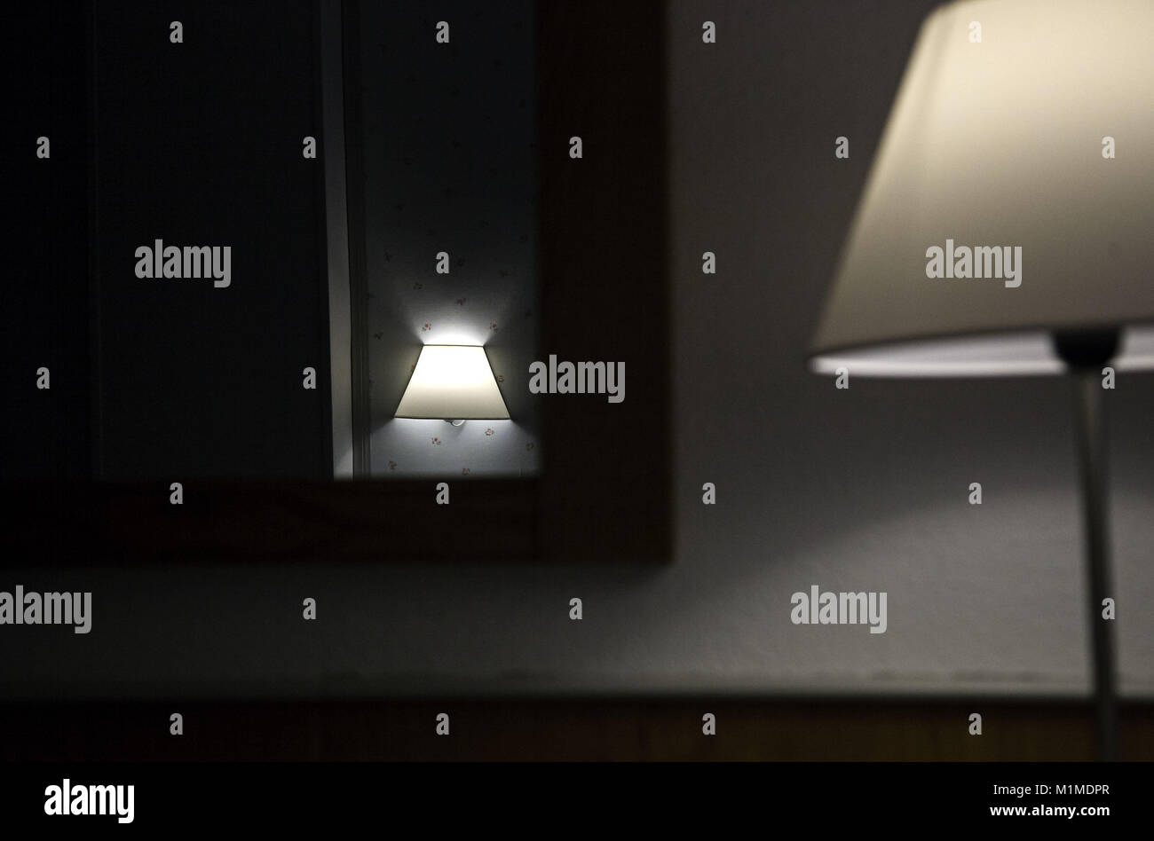 Lamp night table lit in room, decoration objects Stock Photo - Alamy