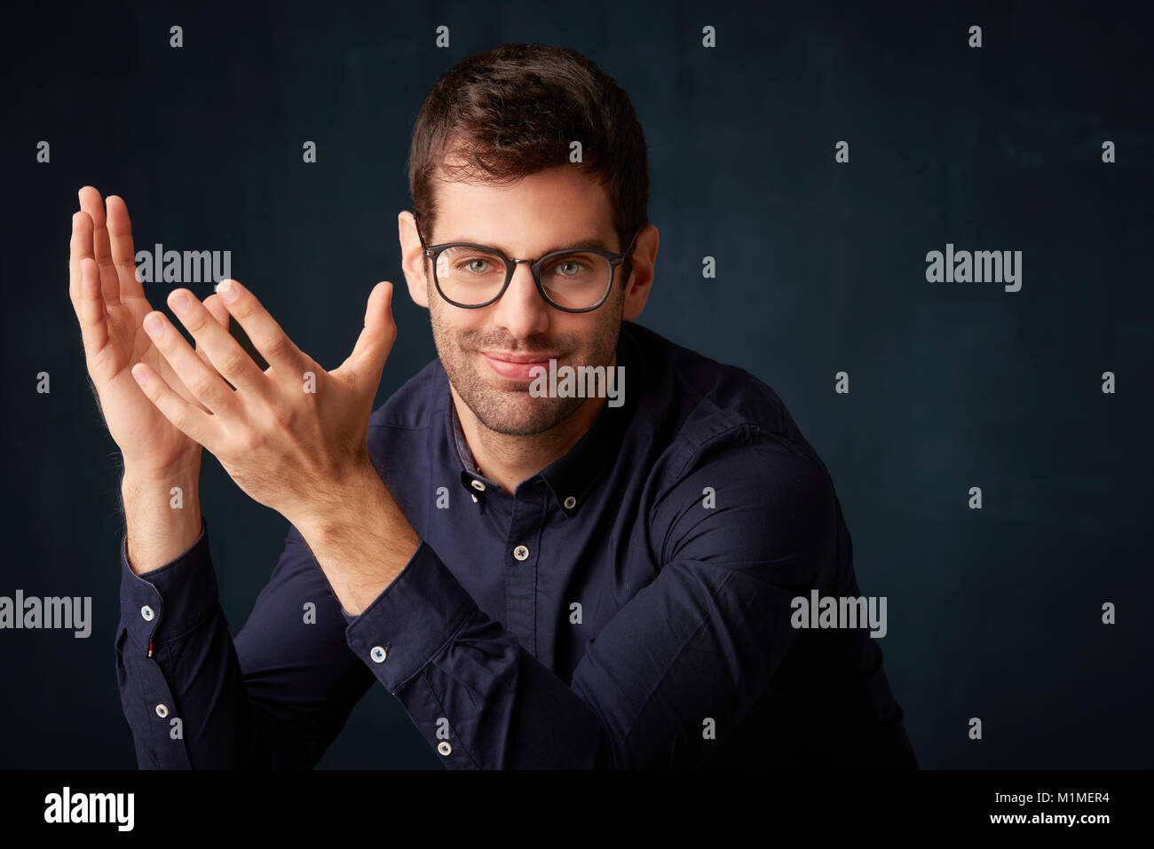 Handsome young man wondering in hi-res stock photography and images - Alamy