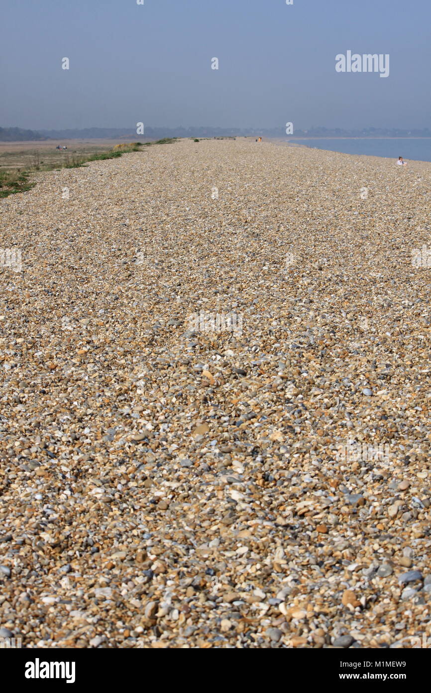 Beautiful empty pebble beach on hi-res stock photography and images - Alamy