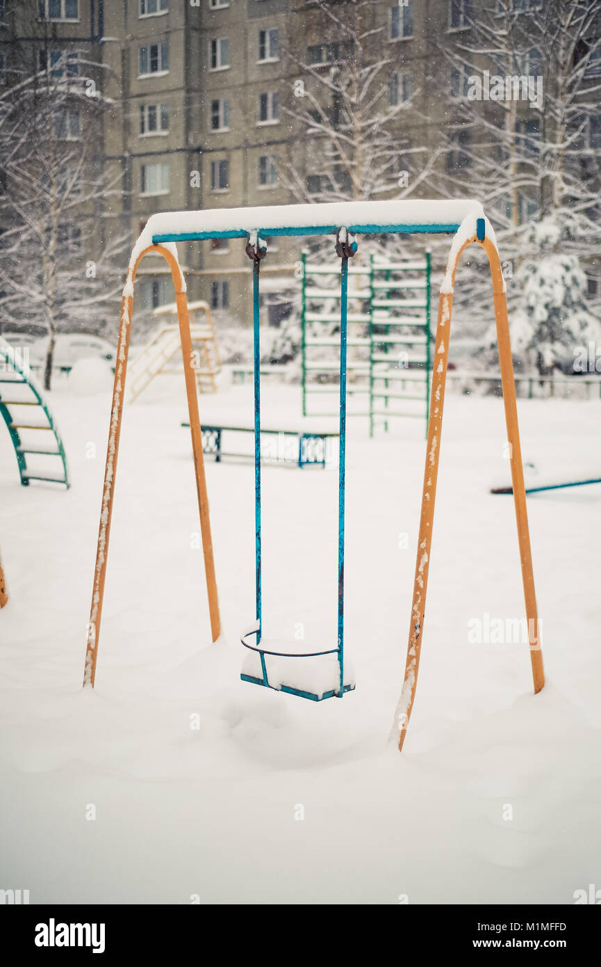 Heavy snowfall. Snow-covered Playground. Community services Stock Photo ...