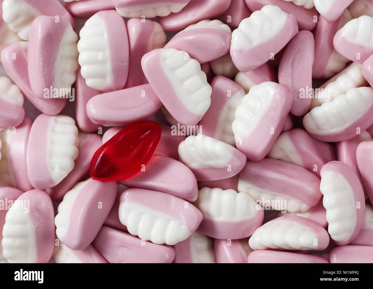 Sweet lips amongst a sea of sweet teeth Stock Photo - Alamy