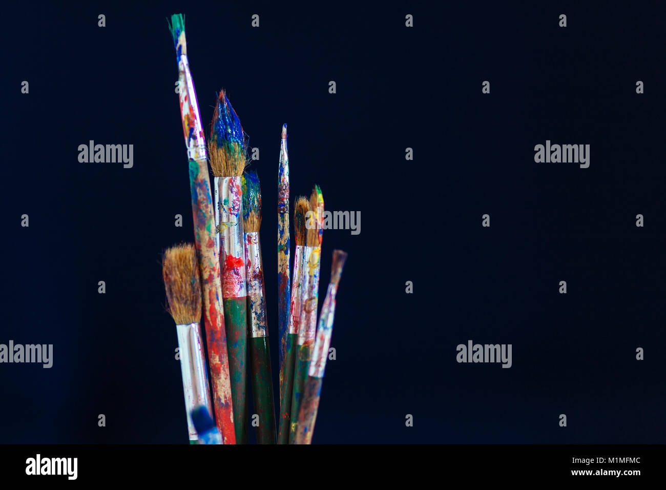 Closeup of colorful paint brushes Stock Photo - Alamy