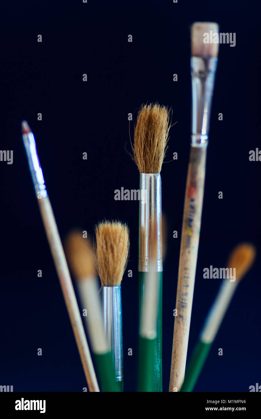 Closeup of colorful paint brushes Stock Photo - Alamy