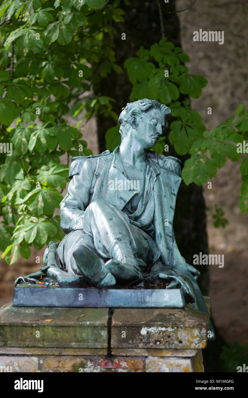 The monument of the wounded Polish soldier in the garden of the castle ...