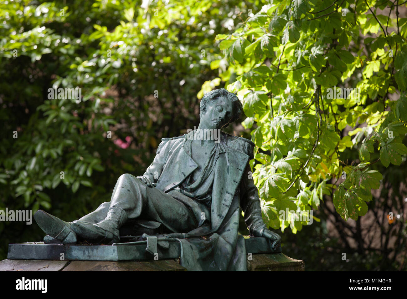 The monument of the wounded Polish soldier in the garden of the castle ...