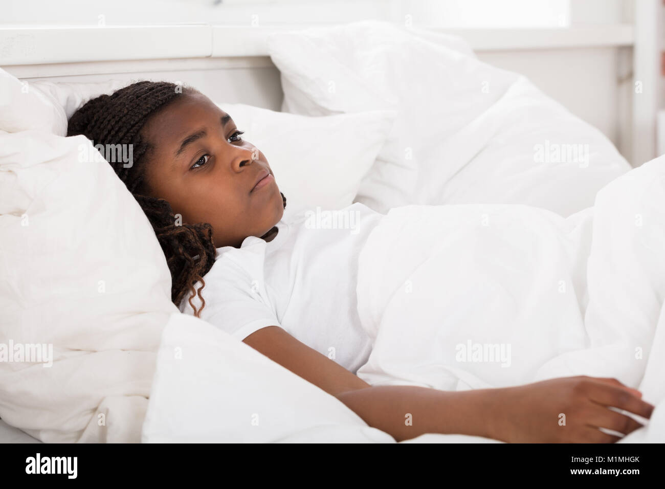 Girl Having Sleeplessness Night In Bed At Home Stock Photo - Alamy