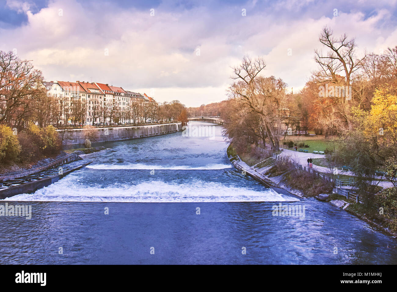 View of the Isar river in Munich, Germany, during the autumn season ...