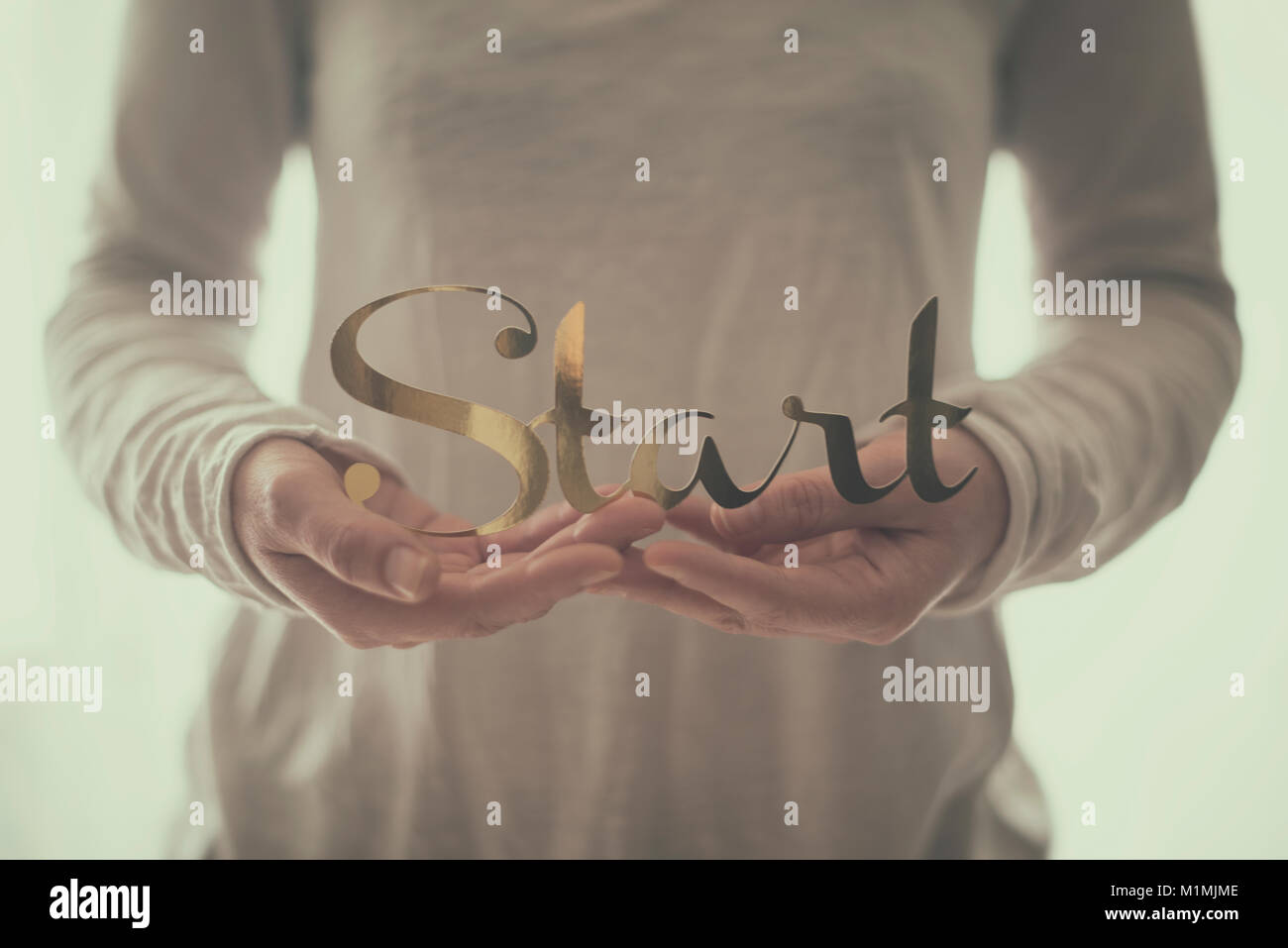 Hands holding text hi-res stock photography and images - Alamy