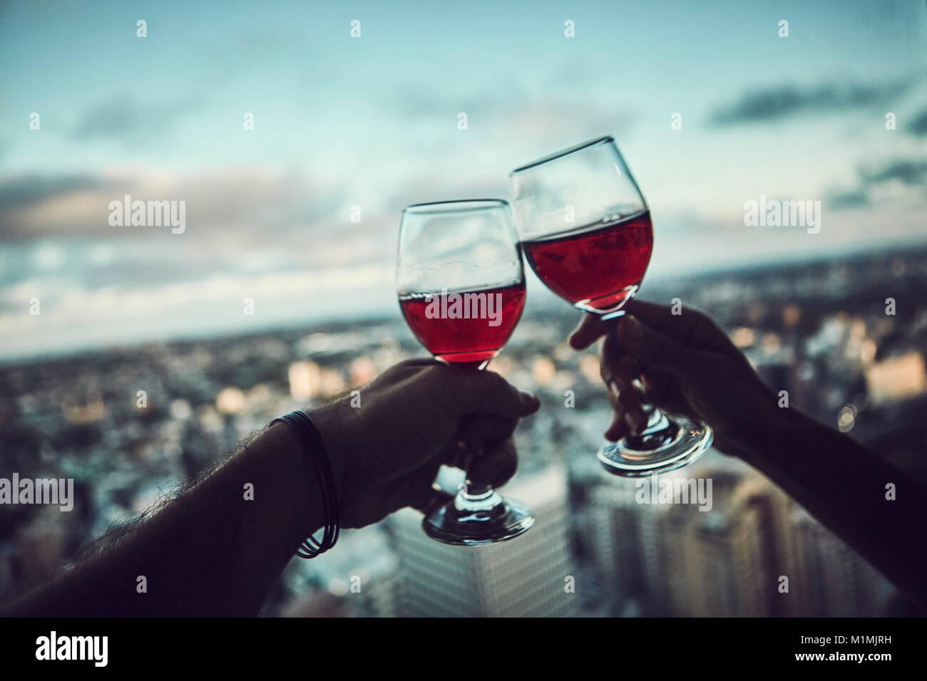 Man and woman making a celebratory toast, Sydney, Australia Stock Photo ...