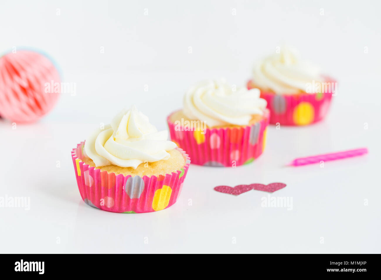 Three birthday cupcakes in a row Stock Photo - Alamy