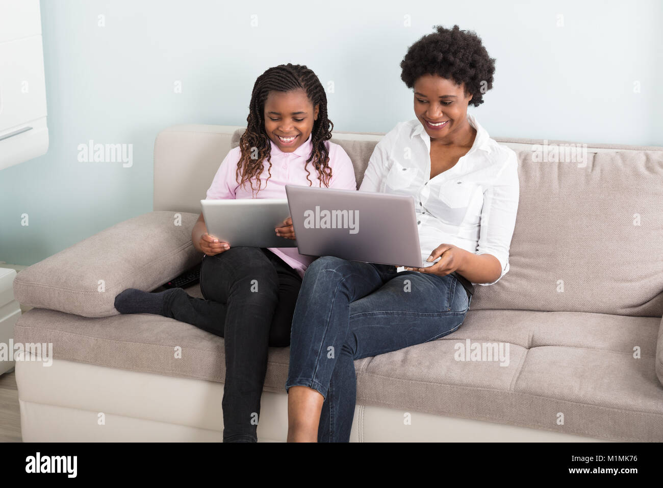 African american family using laptop hi-res stock photography and ...