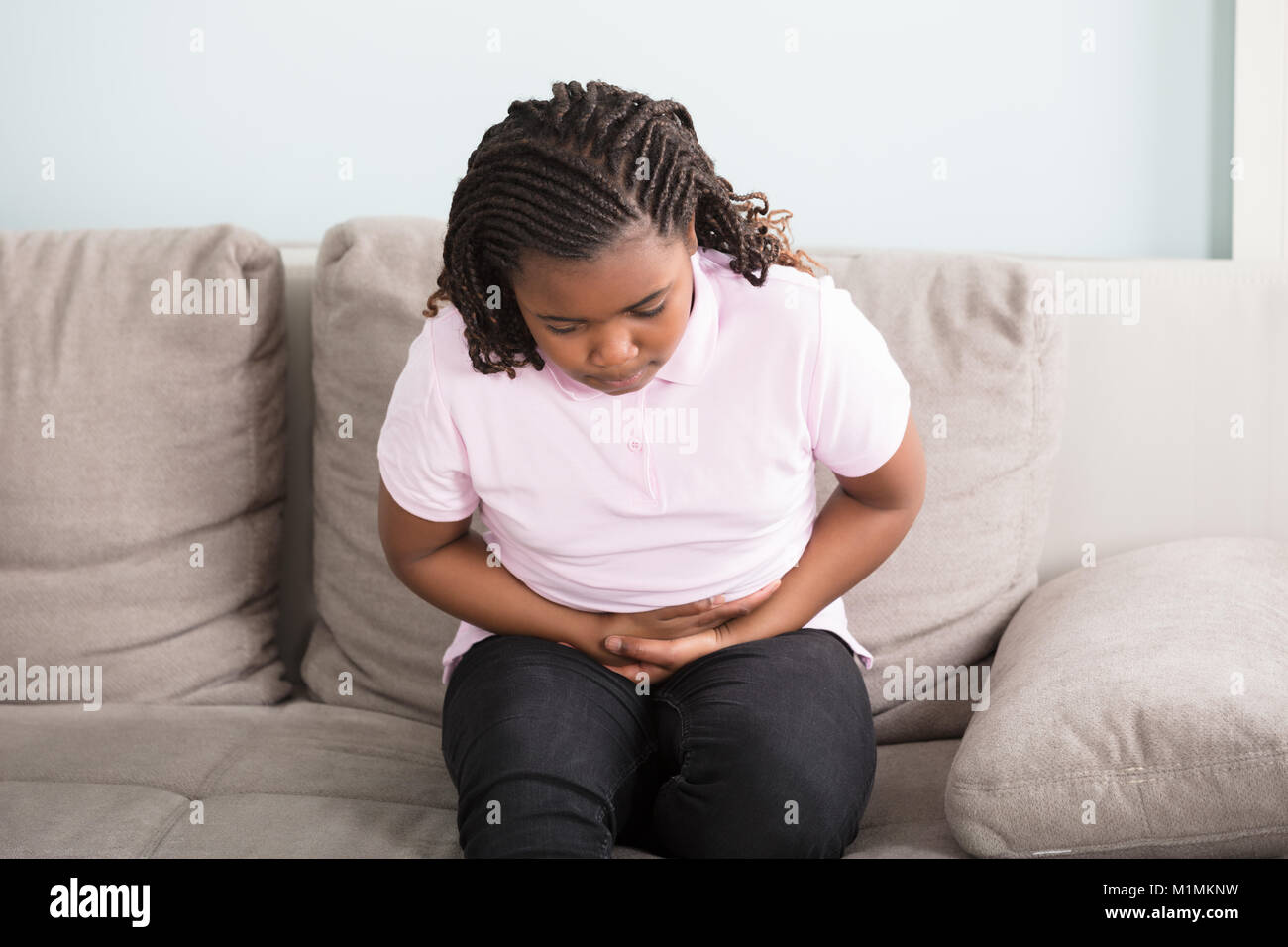 Child stomach ache hi-res stock photography and images - Alamy