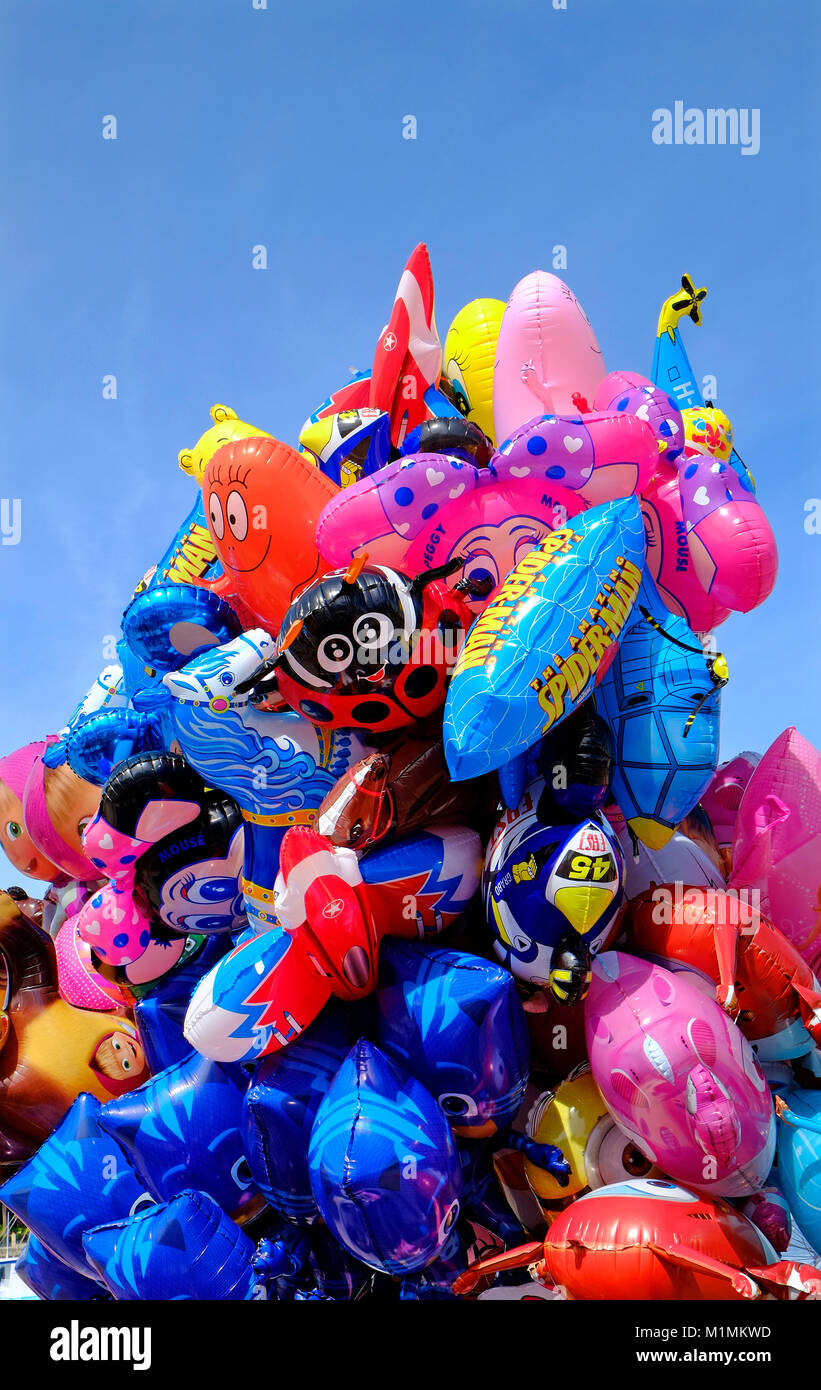 multi-coloured balloons on blue sky background Stock Photo - Alamy