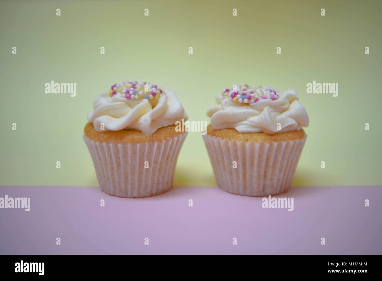 Yellow iced cupcakes hi-res stock photography and images - Alamy