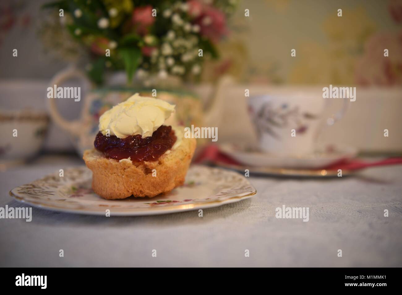 traditional old fashioned afternoon cream tea food with scone cream and ...
