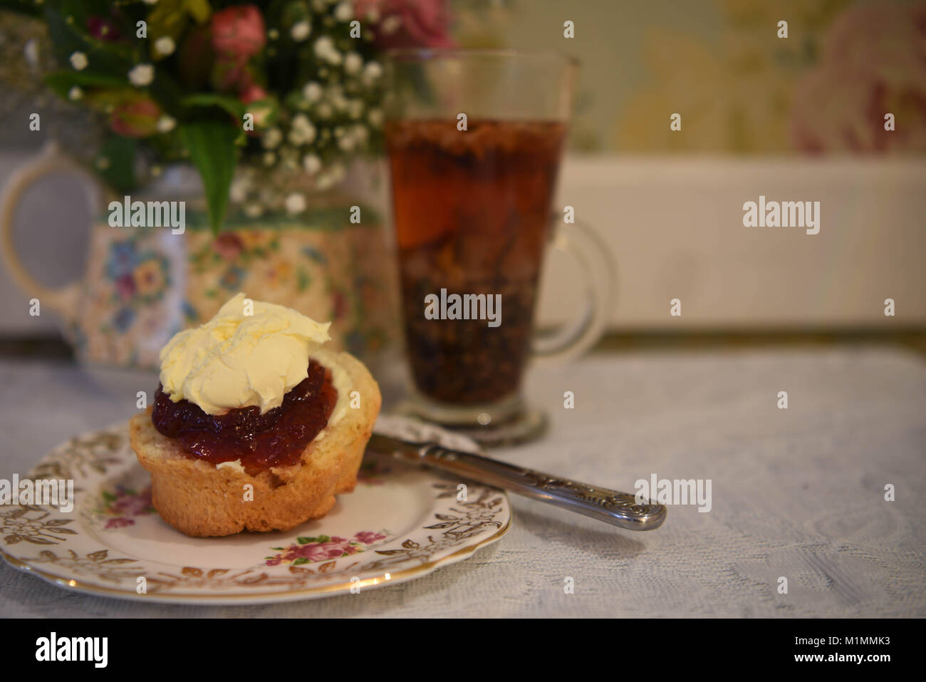 traditional old fashioned afternoon cream tea food with scone cream and ...