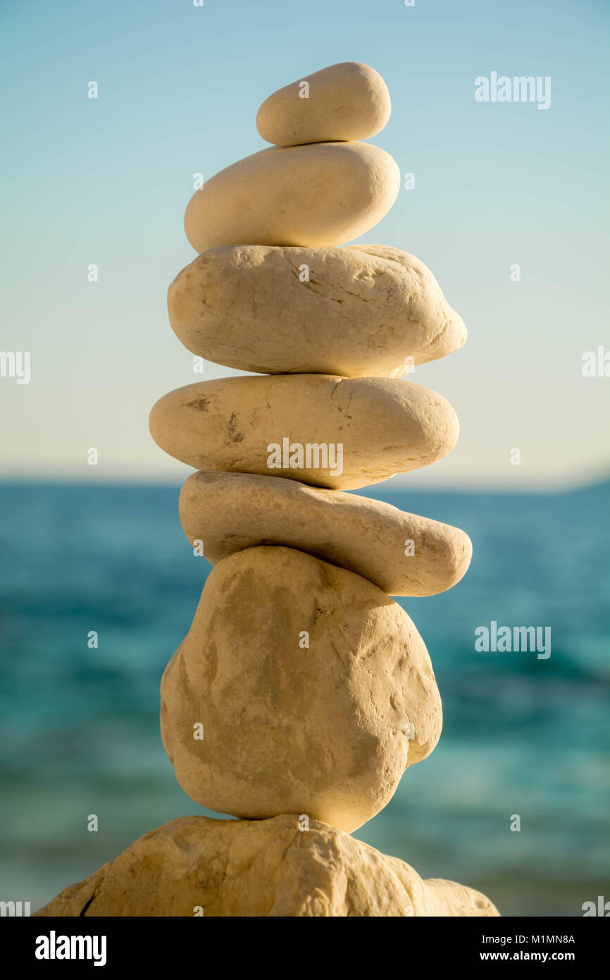 Stone stacked together symbol hi-res stock photography and images - Alamy