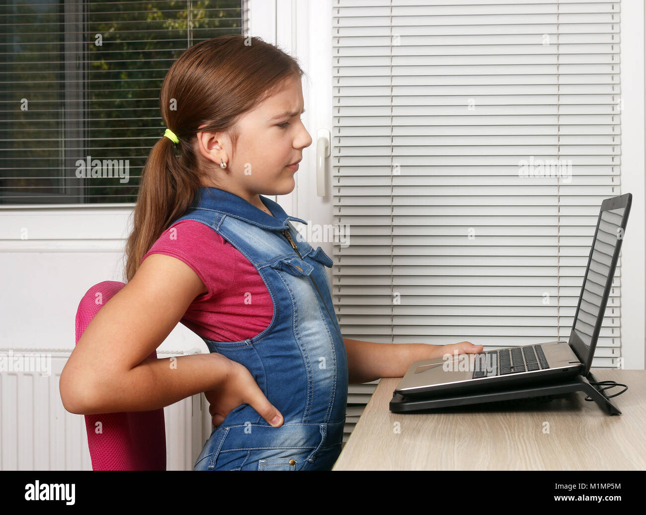 Computer back pain child hi-res stock photography and images - Alamy