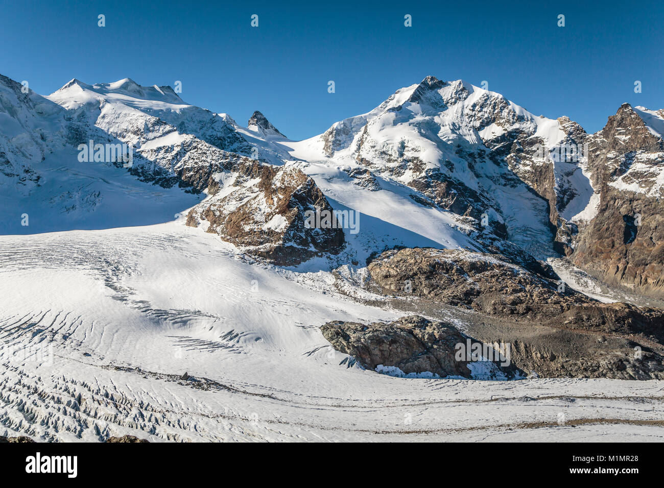 The Bernina mountain peaks and the Diavolezza Glacier near St. Moritz ...
