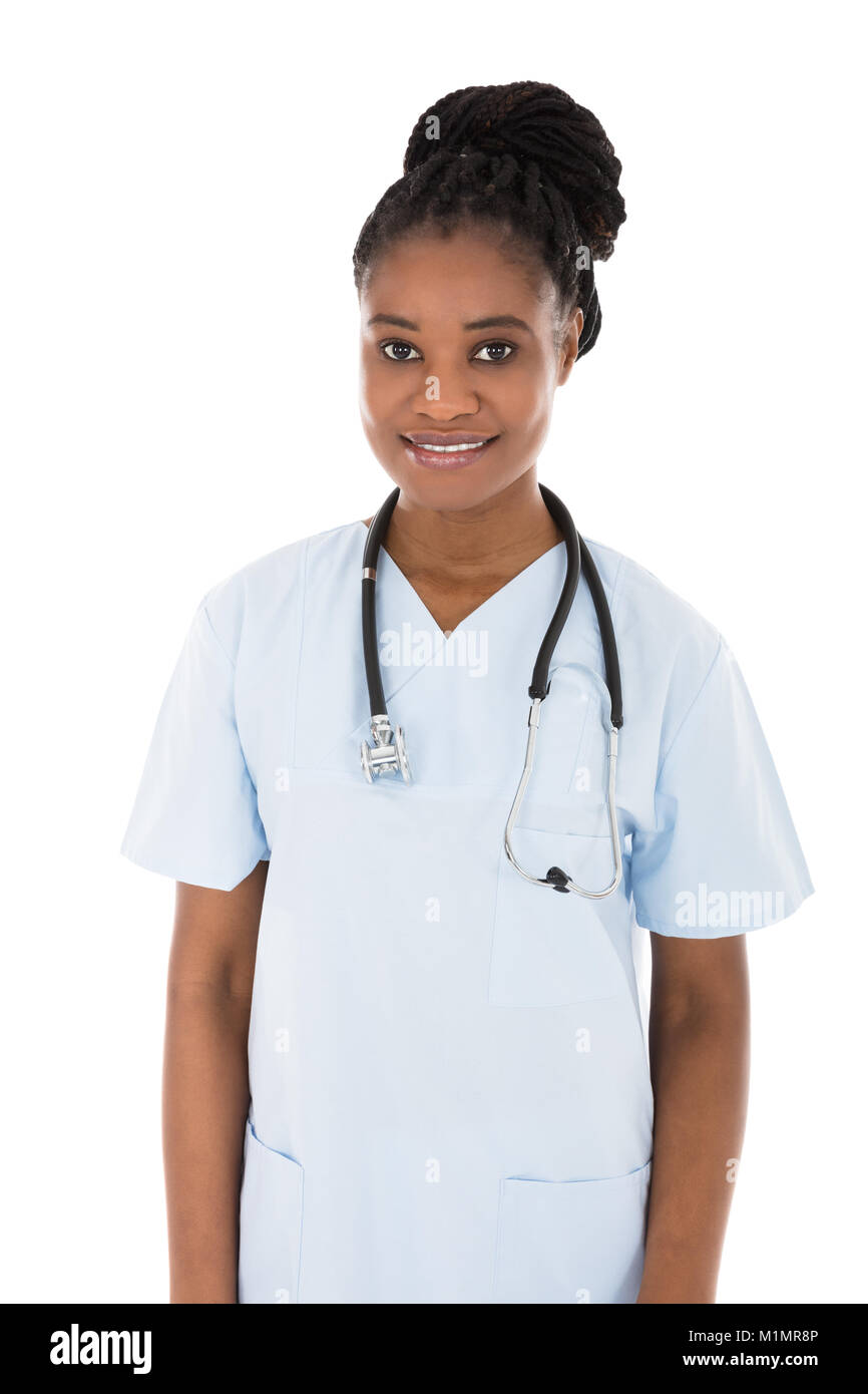 Happy African Female Doctor Standing In Front Of White Background Stock ...
