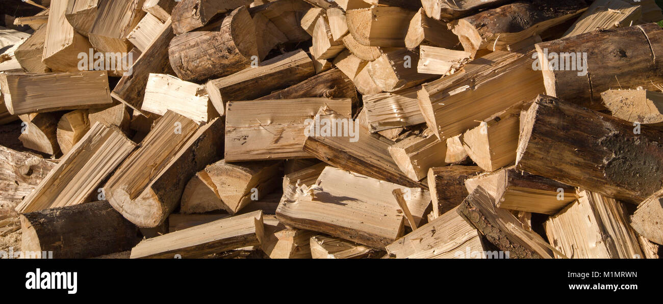 Pile of wooden Logs ready for Carving woodcutting.Panoramic image for ...