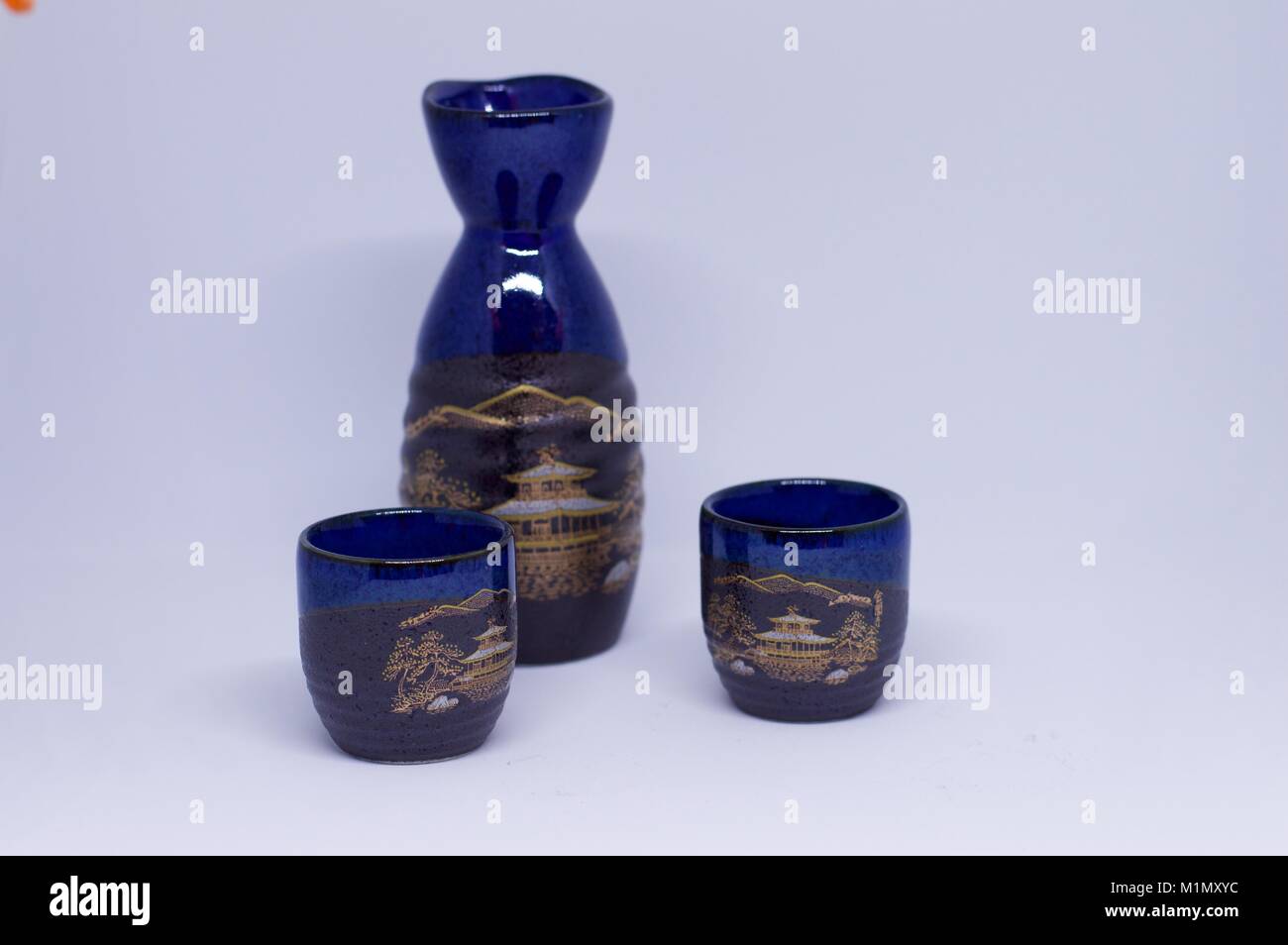 Blue Japanese Sake set with pagoda and mountain pattern photographed ...
