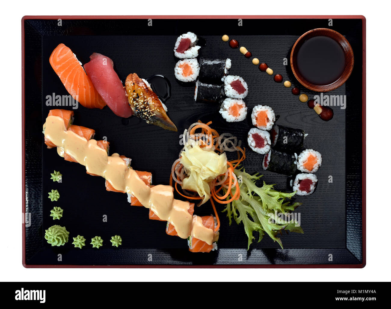 Sushi dish with sauce on UraMaki, Maki, NIGIRI with salmon, tuna, eel ...