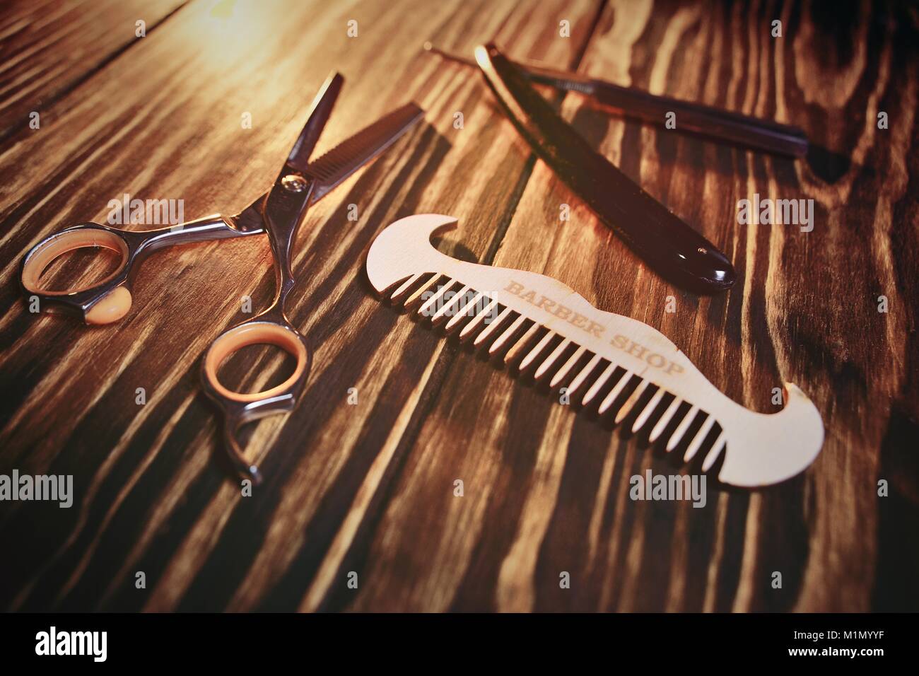 tools barber on a wooden background Stock Photo - Alamy
