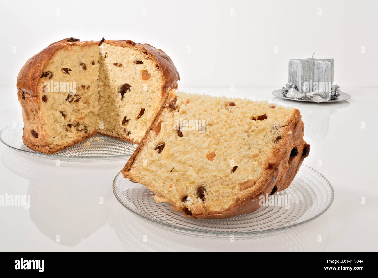 traditional low panettone cut with Italian Christmas sweet slice Stock ...
