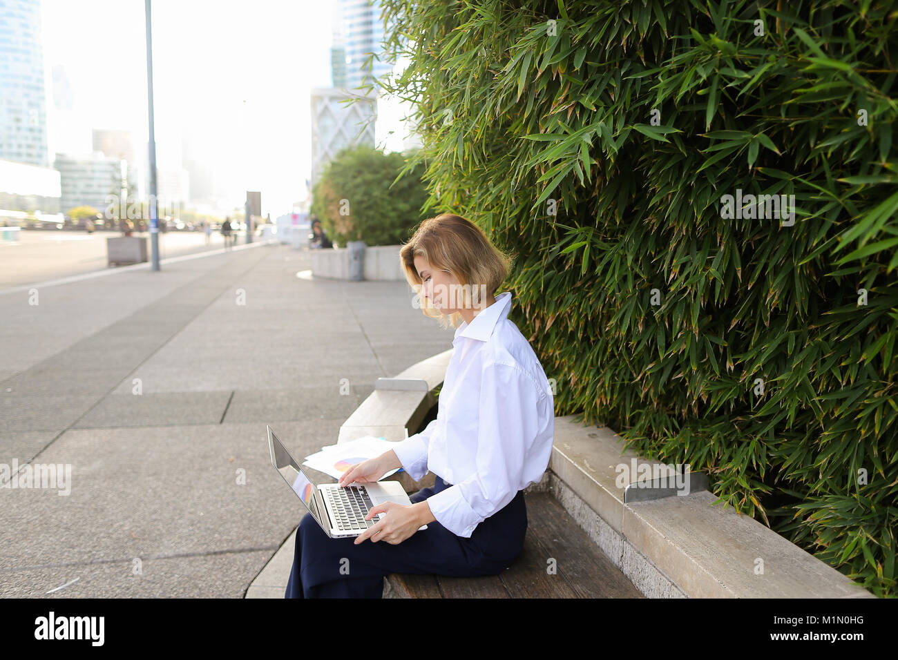 Statistician working outside laptop color hi-res stock photography and ...