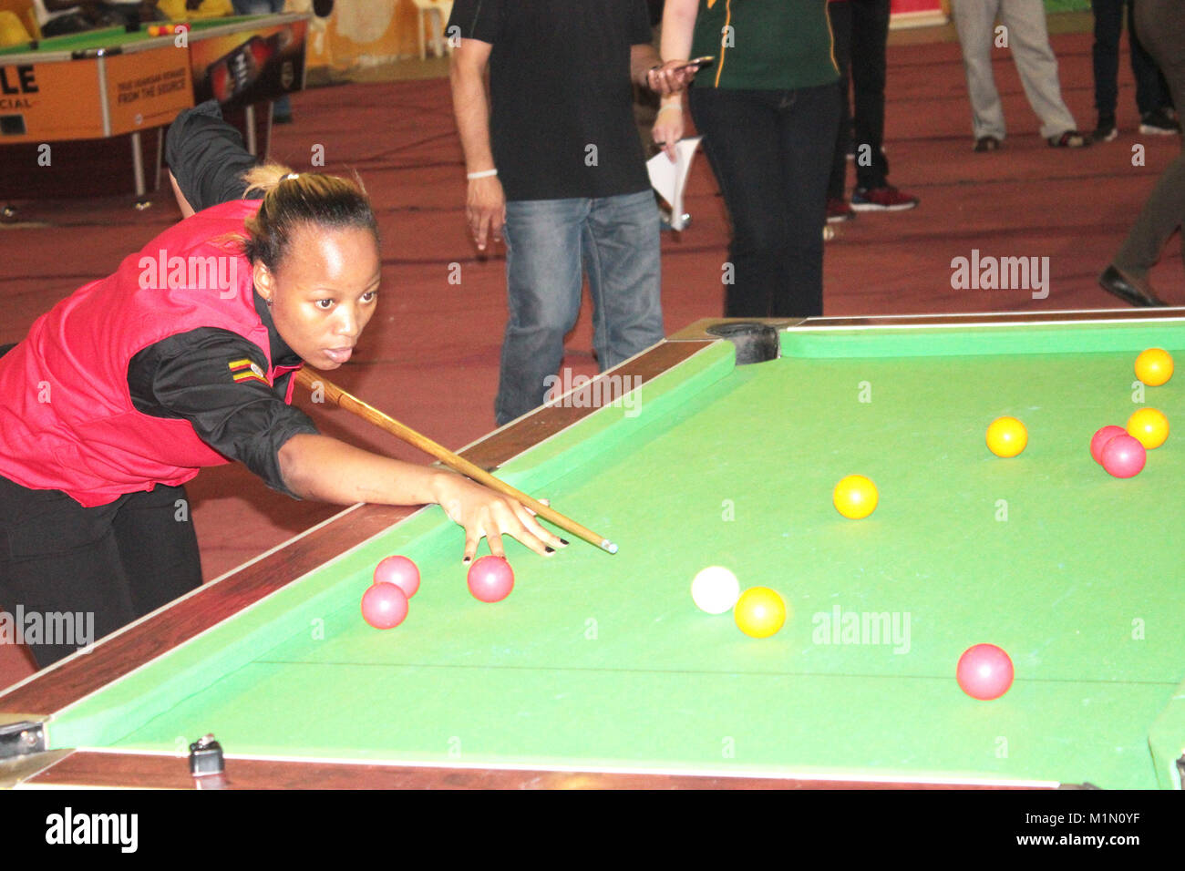 A Ugandan national pool player Riita Nimusiima in action during the ...