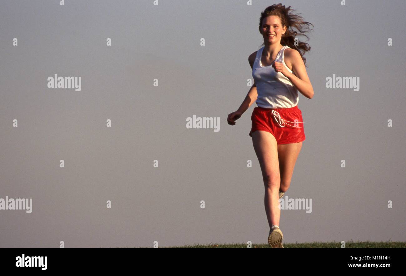 Model running in a London park c 1991 with no logos on clothes ...