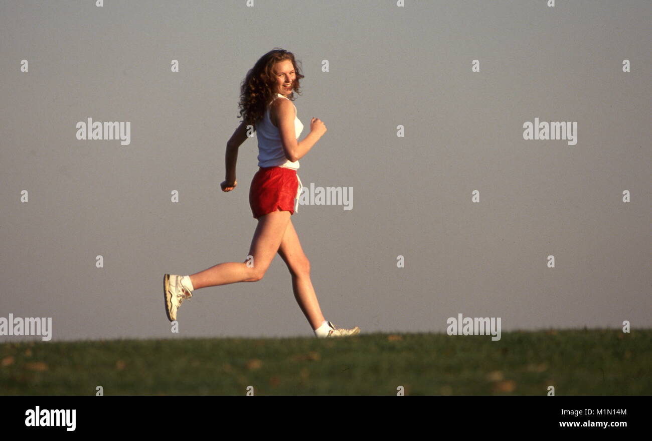 Model running in a London park c 1991 with no logos on clothes ...