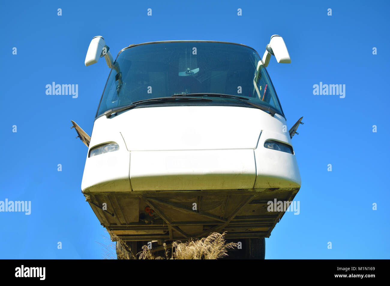 big white bus bottom taken from the photo Stock Photo - Alamy